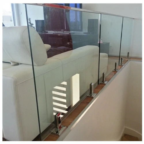 frameless glass railing with slotted rail on top